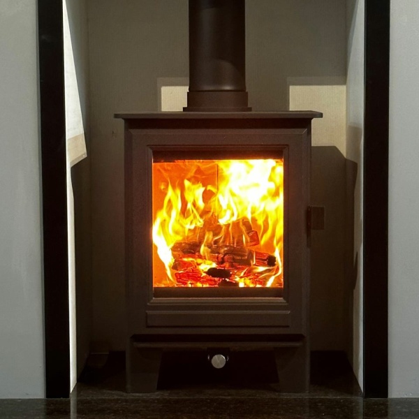 Clock Sudbury COMPACT Wood Burning Stove - 5kw - NaturalHeating.co.uk